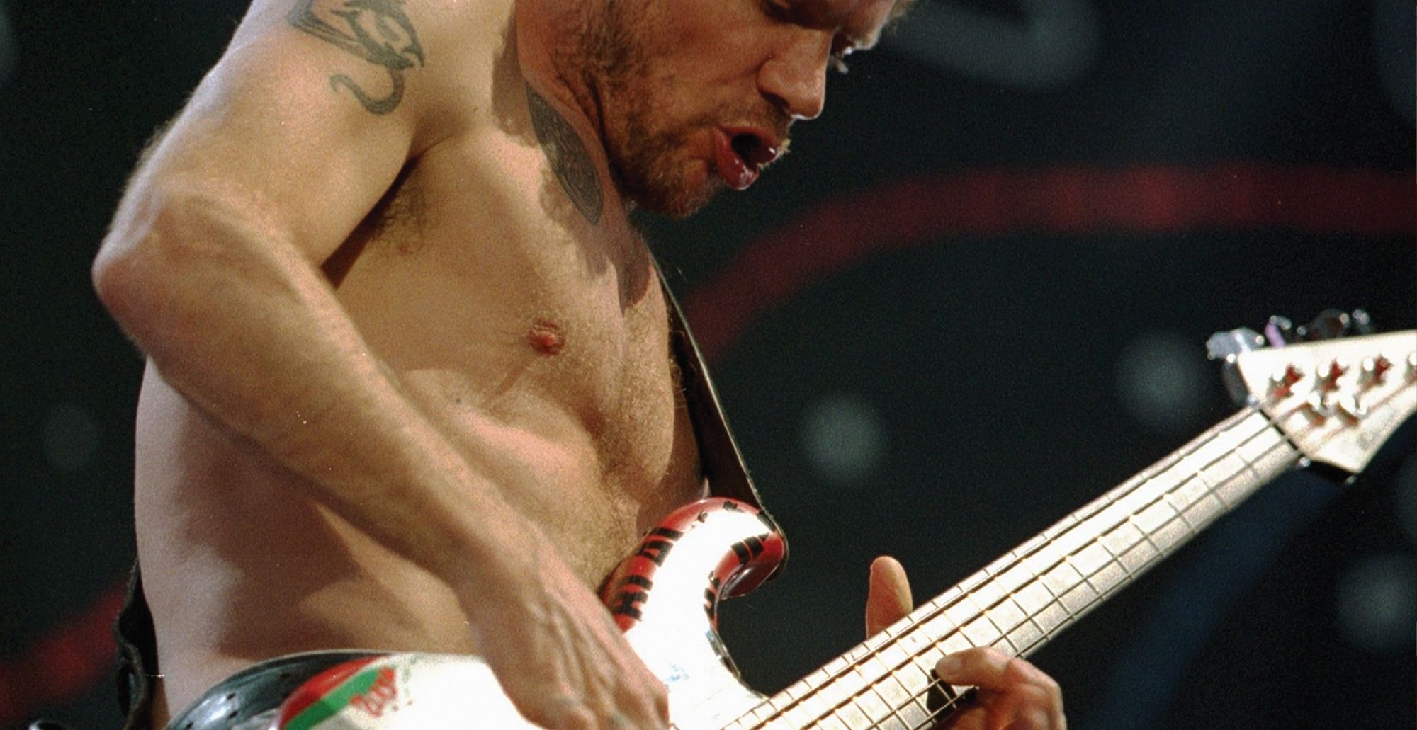 Flea Guitar Lessons & Backing Tracks | LickLibrary