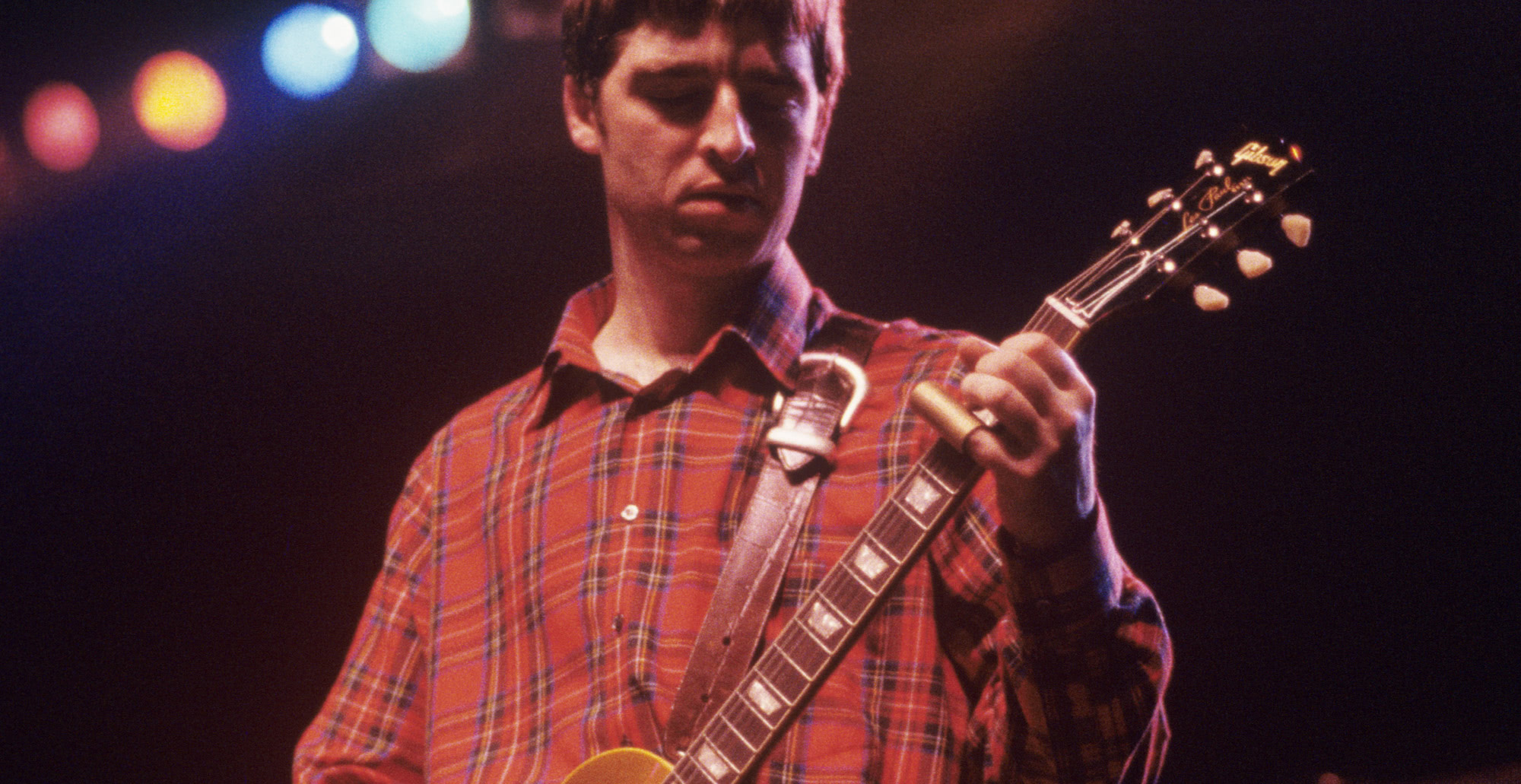 Oasis Guitar Lessons & Backing Tracks | LickLibrary